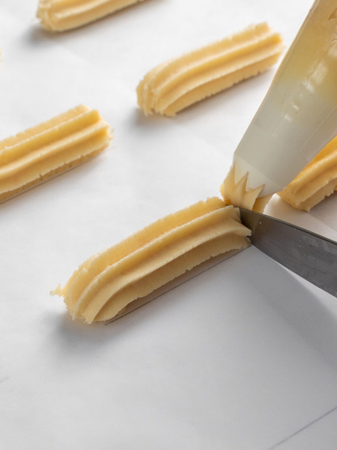 Piped Butter Cookies with Raspberry Jam (Viennese Whirls) - The Scranline