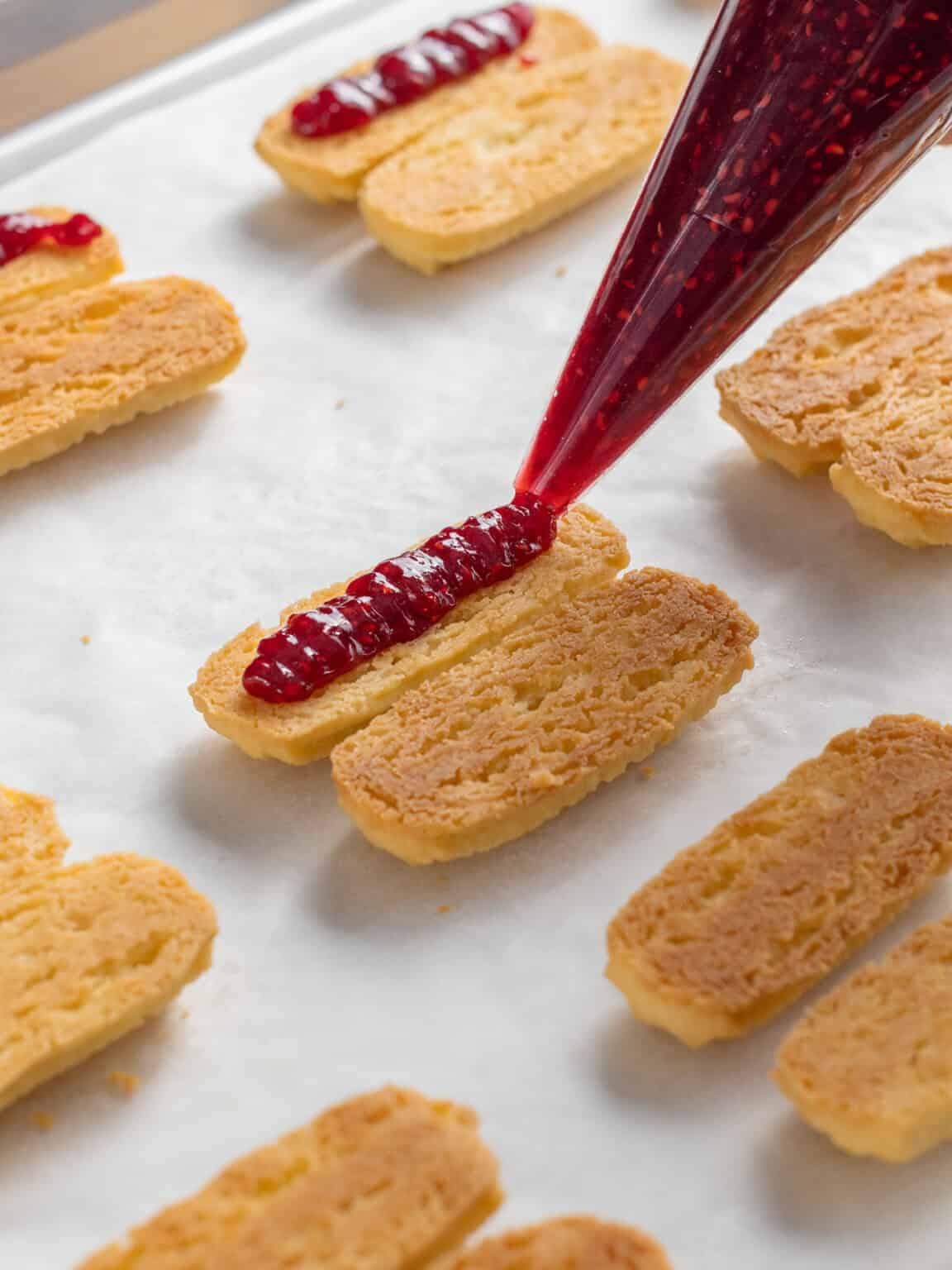 Piped Butter Cookies with Raspberry Jam (Viennese Whirls) - The Scranline